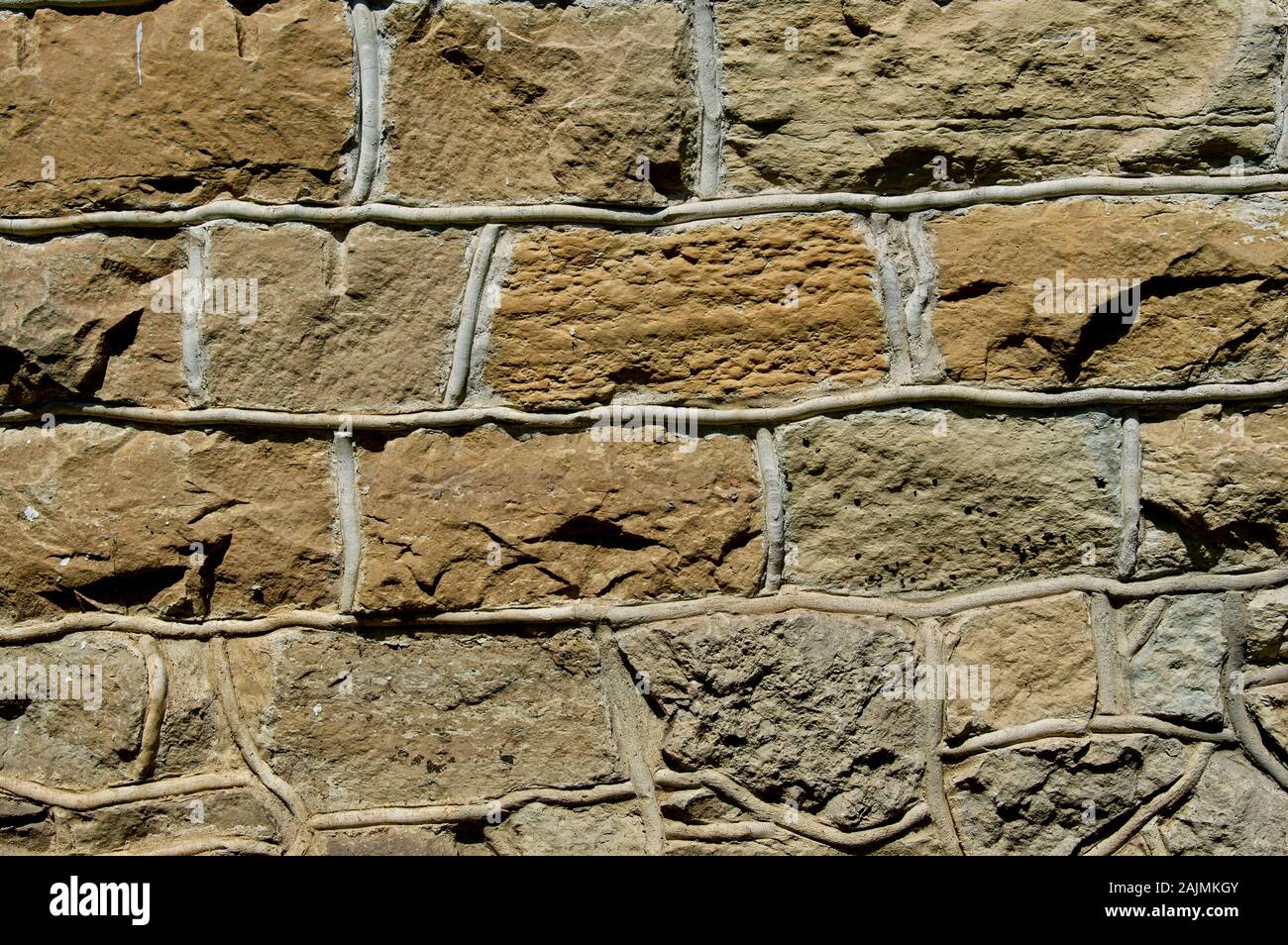 Old stone building wall from a historic structure showing the pattern ...