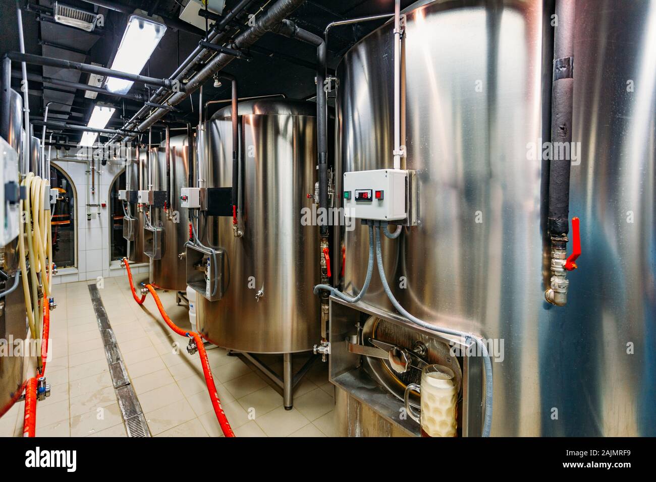 Craft beer production line in private microbrewery Stock Photo - Alamy