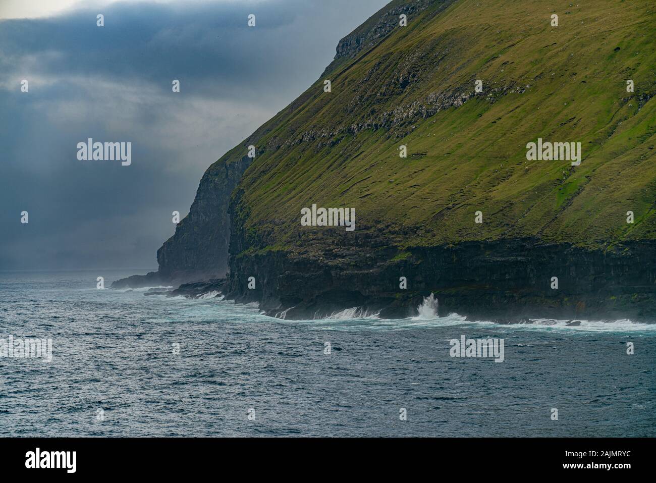 Dramatic seashore and cliffs near Gjogv village, in Eysturoy, Faroe ...