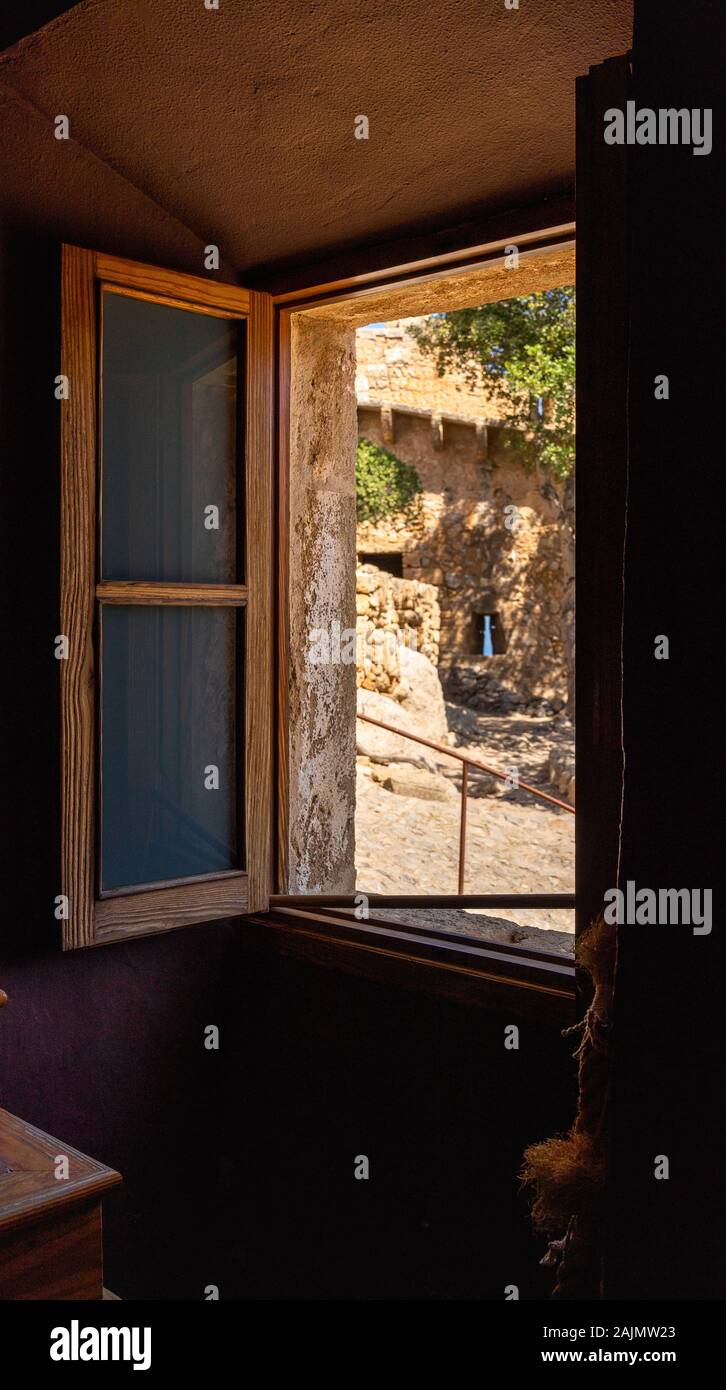 Look on castle wall through open window Stock Photo - Alamy