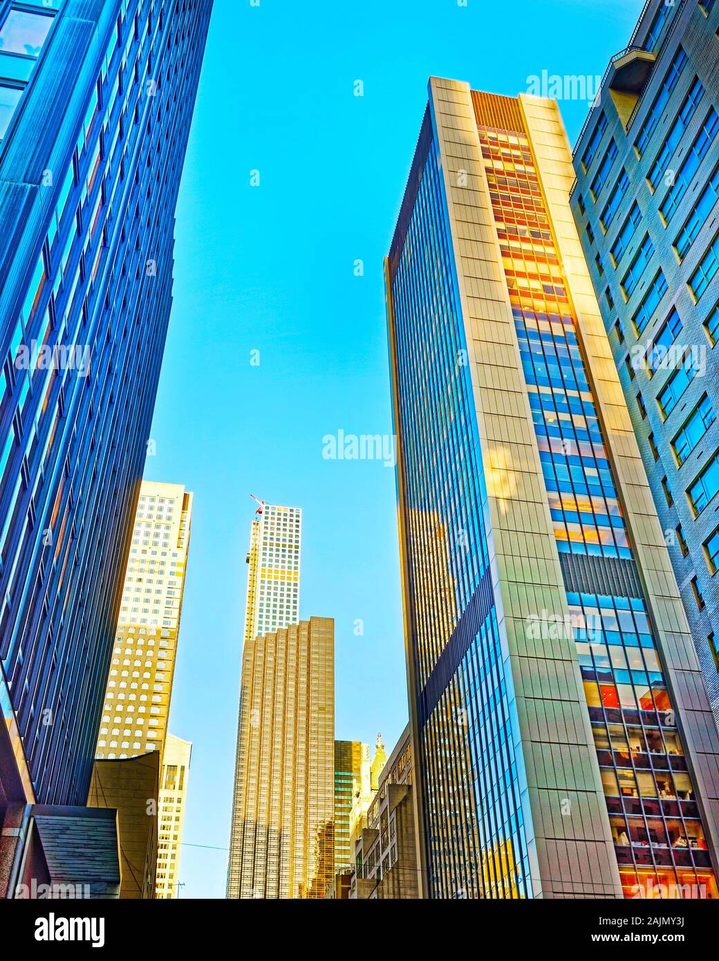 Bottom up view of Manhattan Skyscrapers with reflection reflex Stock ...