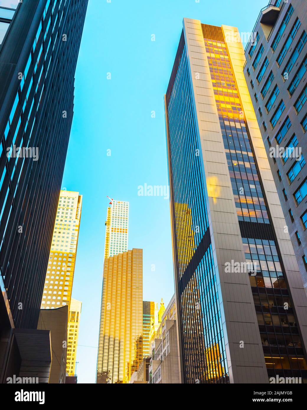 Bottom up view of Manhattan Skyscrapers with reflection NYC reflex ...