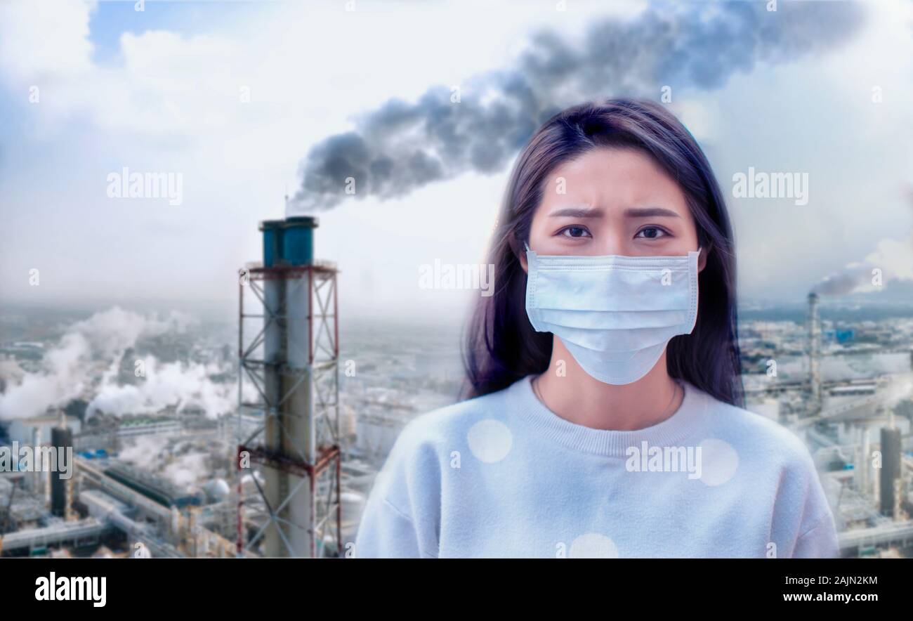 young woman wear mask with air pollution background Stock Photo - Alamy