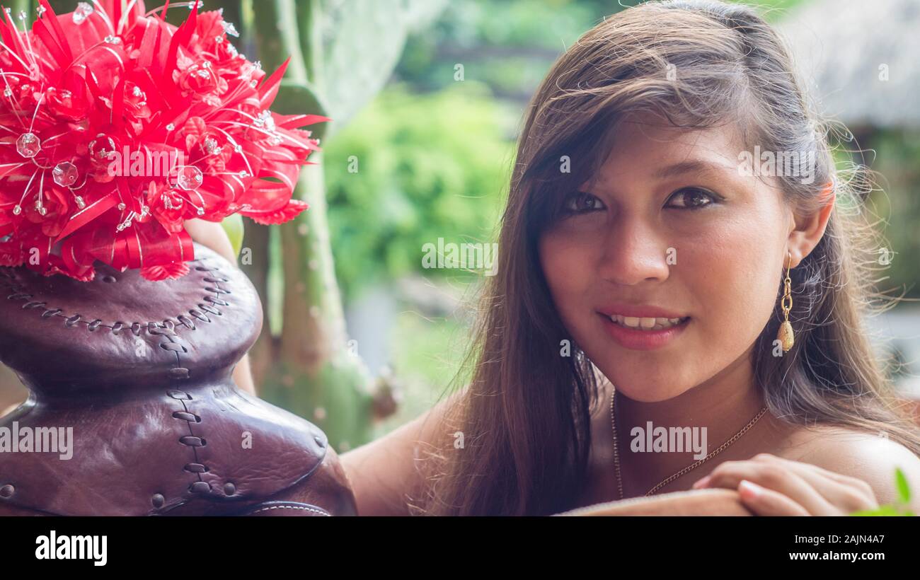 Mexican brown hair light eyes, pink lips, Saddle Stock Photo - Alamy
