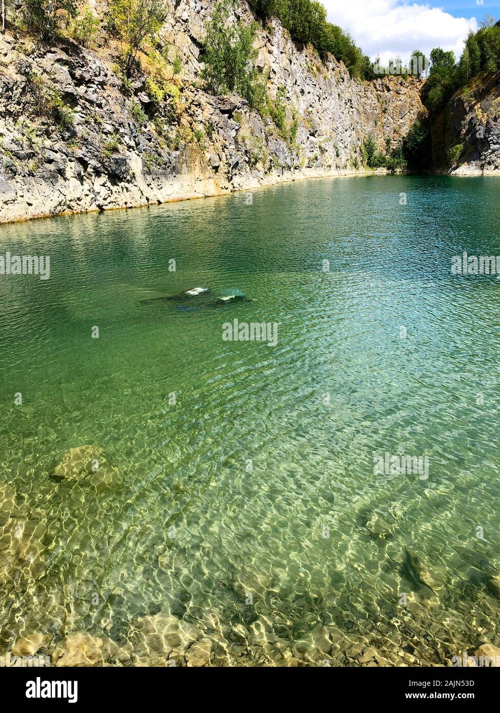 Quarry explored by scuba divers. Flooded quarry for adrenaline hobby ...