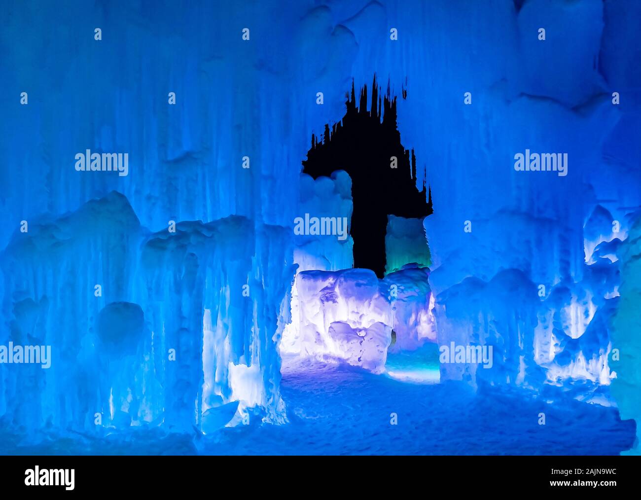 Colorful ice castle formations at night time Stock Photo - Alamy