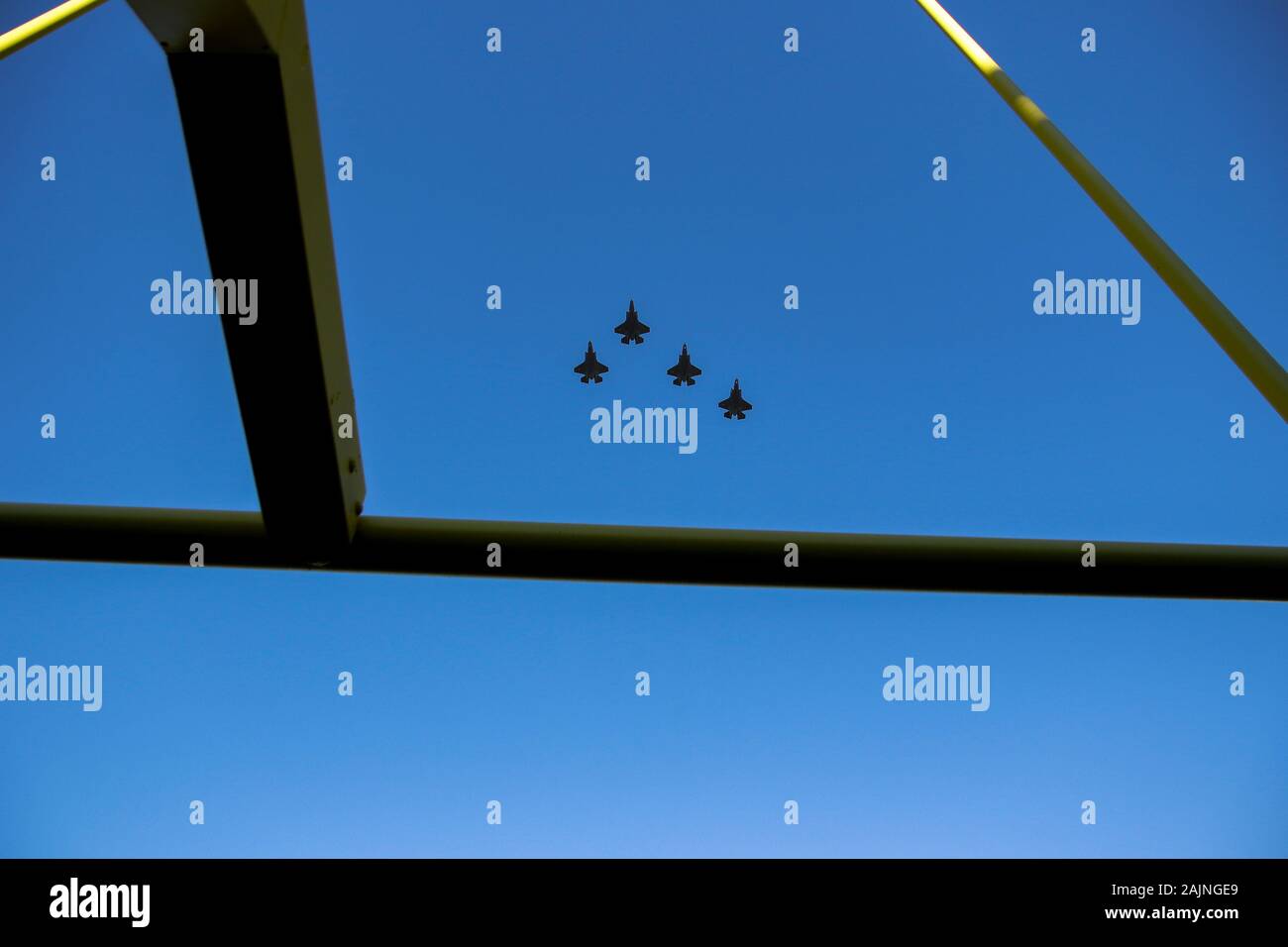 The Armed Forces Bowl flyover flying through the uprights during the ...