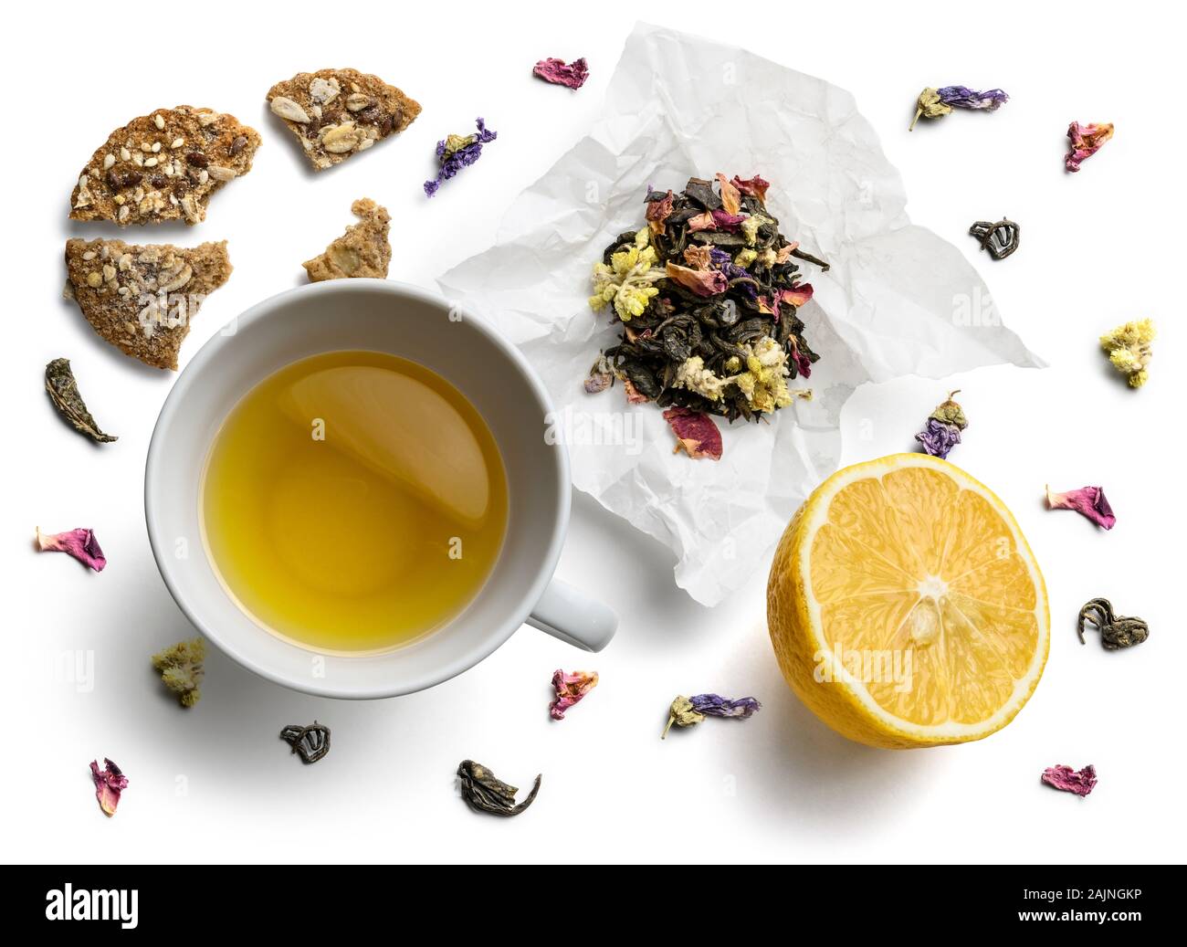 Green tea with natural aromatic additives. Top view on white background ...