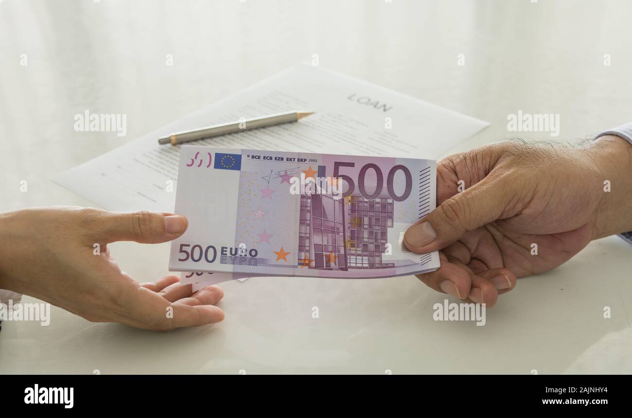 Business loan from a bank employee. finance concept Stock Photo - Alamy