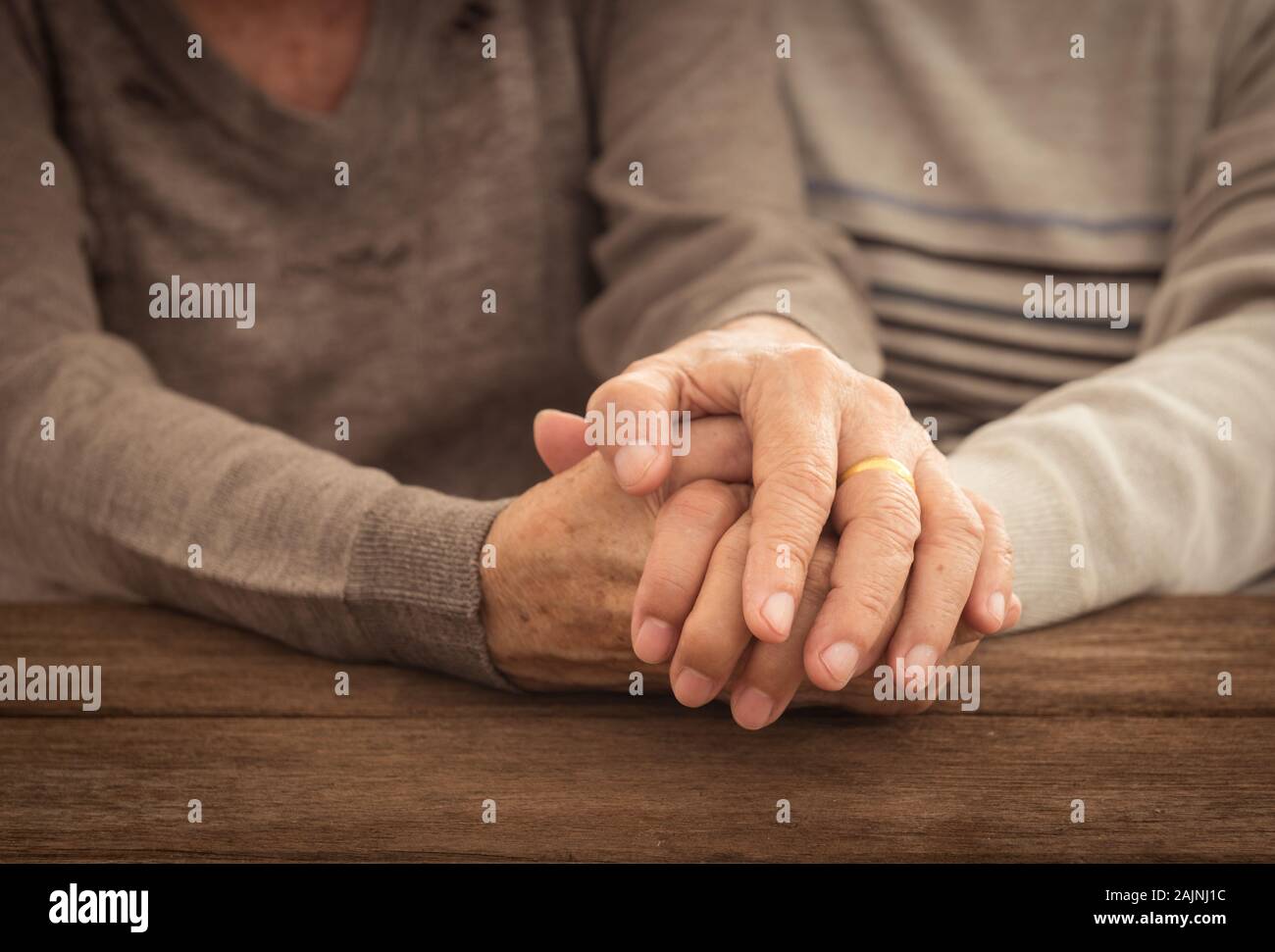 Old people holding hands. couple concept. love concept Stock Photo - Alamy