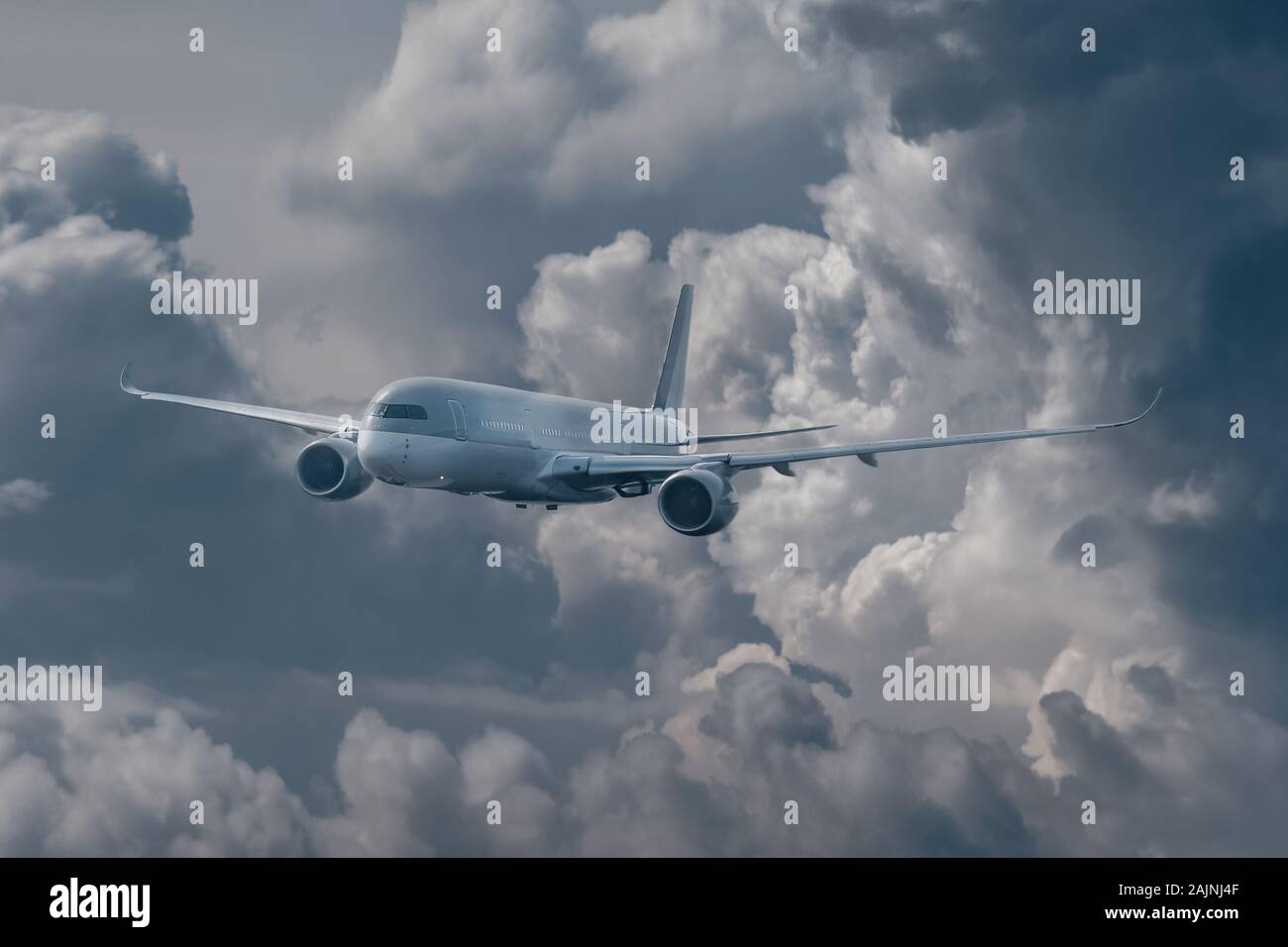 Passenger plane takes off from the stormy dark clouds. The concept of ...