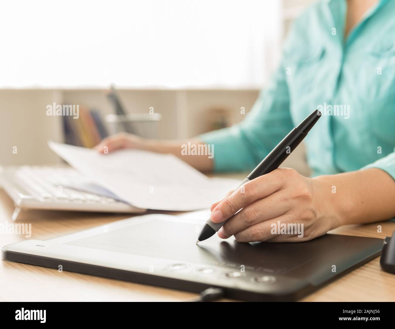 designers hand use mouse pen and computer working on new projects Stock ...