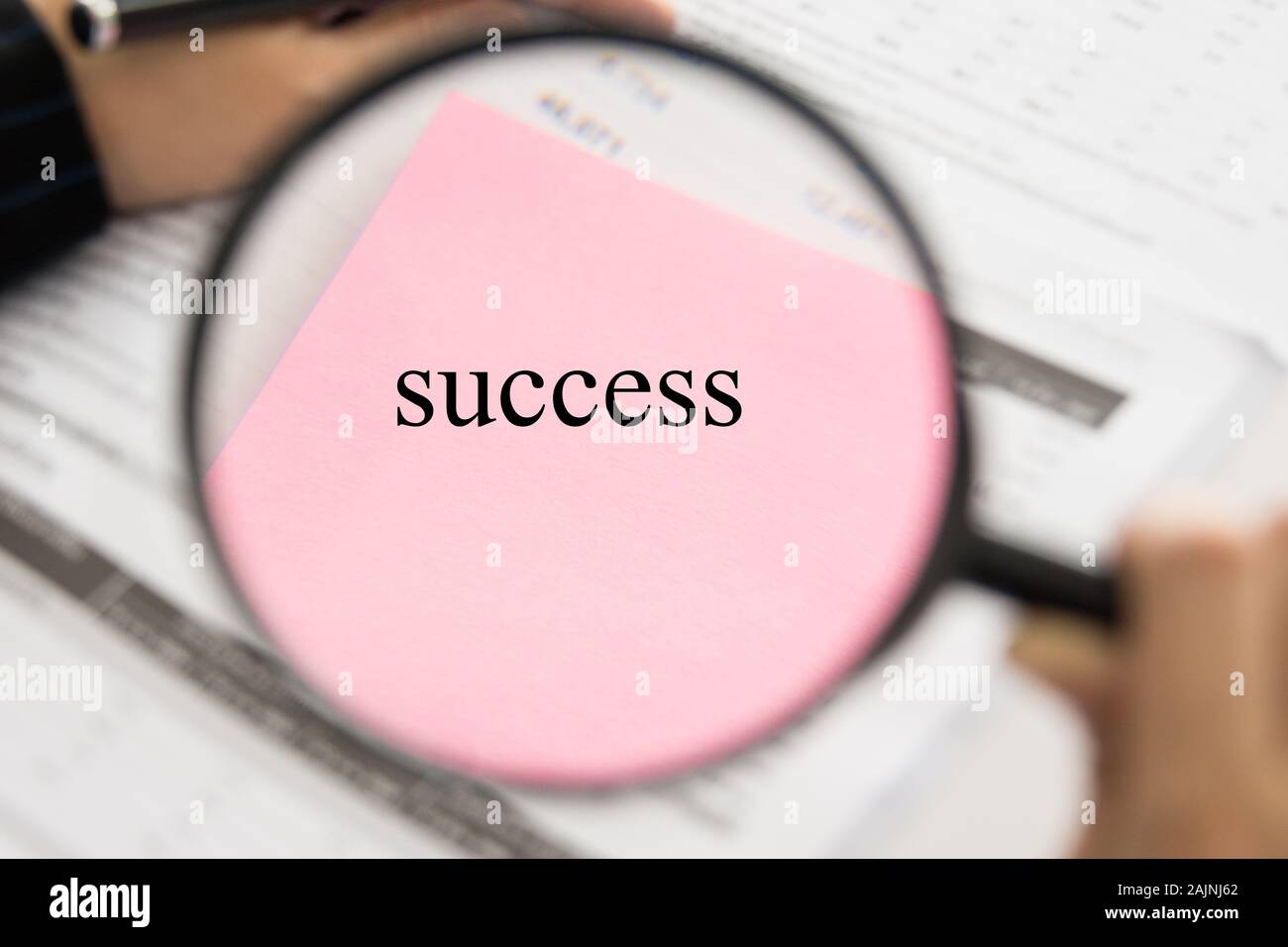 business success concepts. Business people using a magnifying glass ...