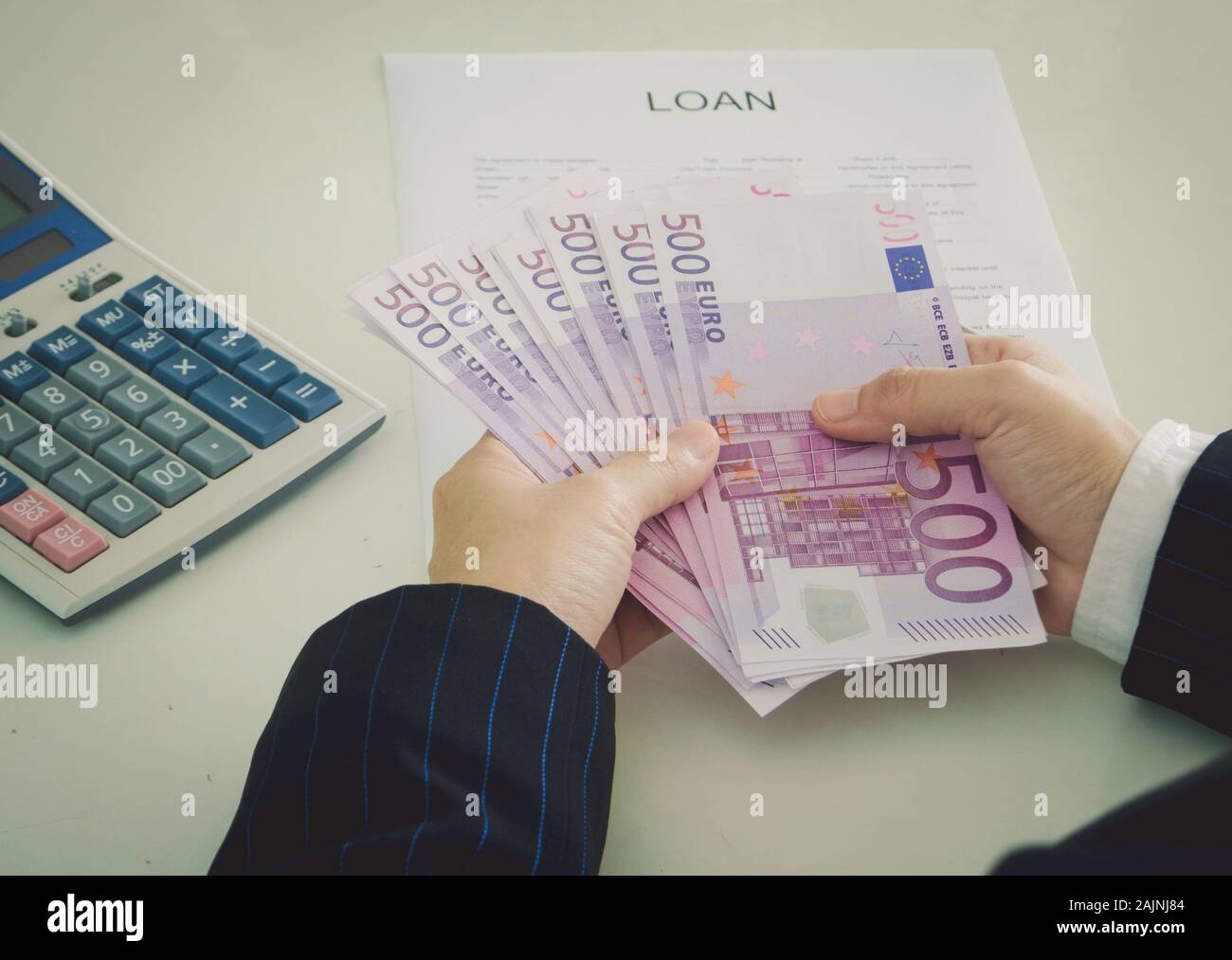 Business loan from a bank employee. finance concept Stock Photo - Alamy