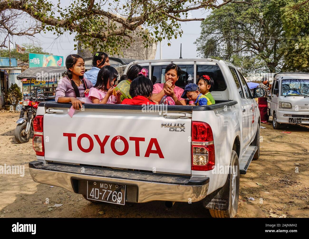 Bagan, Myanmar - Feb 18, 2016. People with the local bus on rural road ...