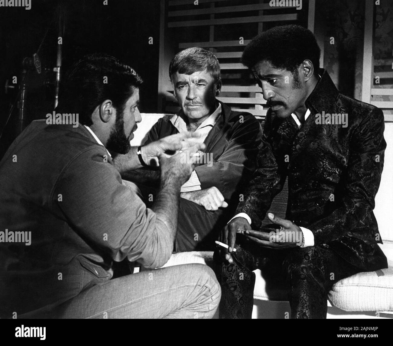 Director JERRY LEWIS on set candid with PETER LAWFORD and SAMMY DAVIS ...