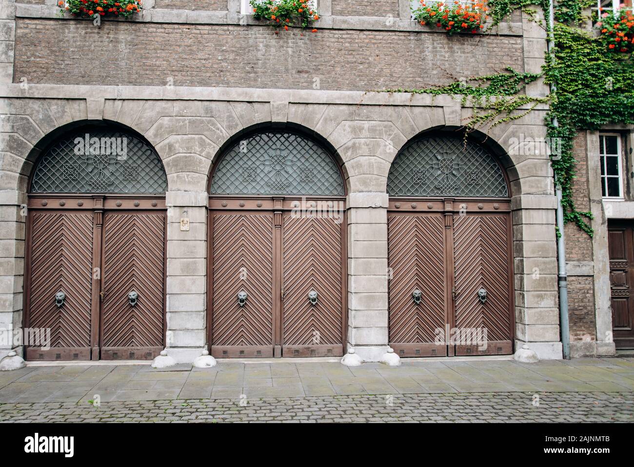 Lots of old doors side by side in the building Stock Photo - Alamy