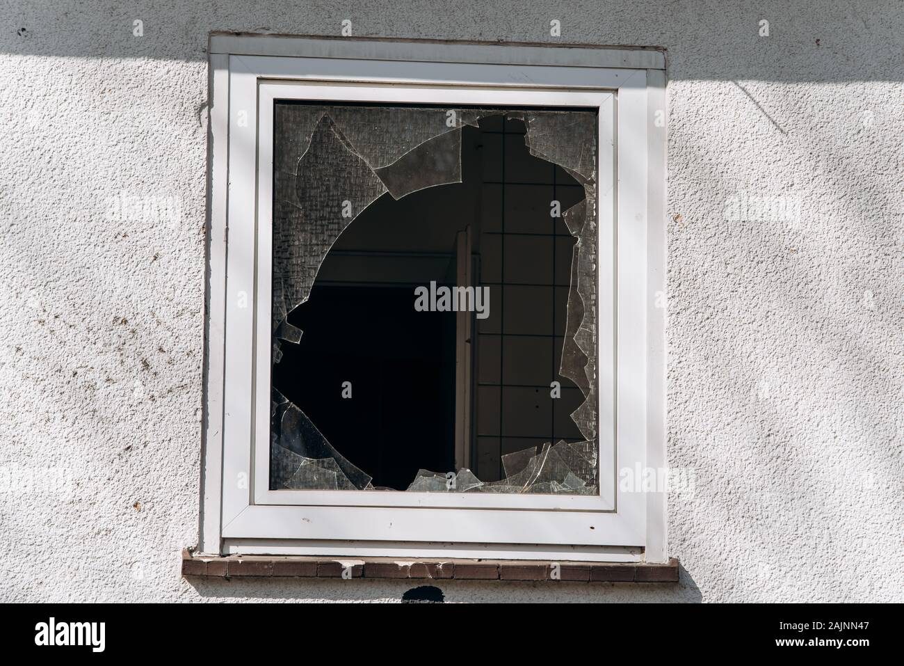 Broken Windows in the house. Shards of glass remained in the window ...