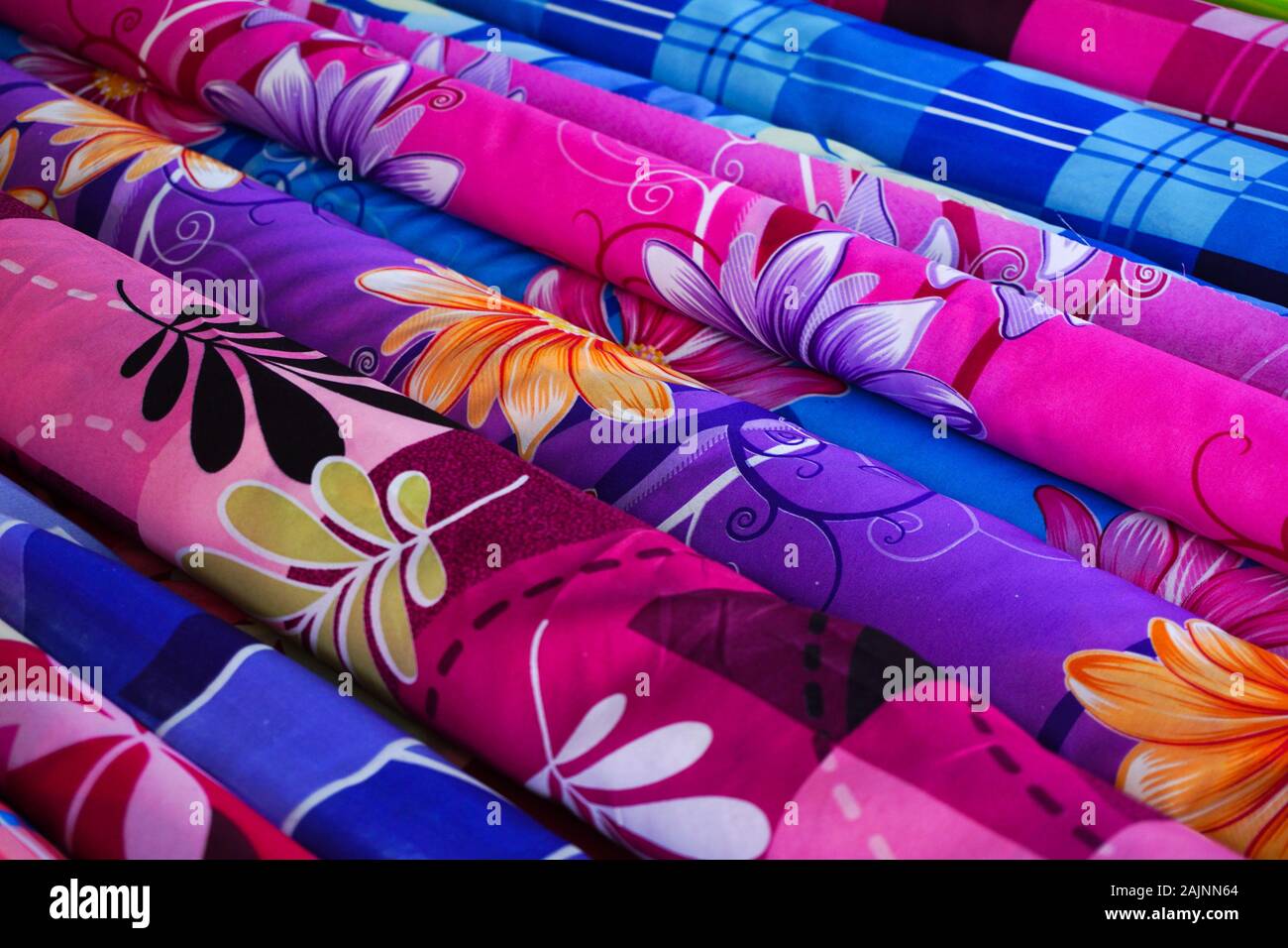 Colorful textile for sale at the street market in Malacca, Malaysia ...