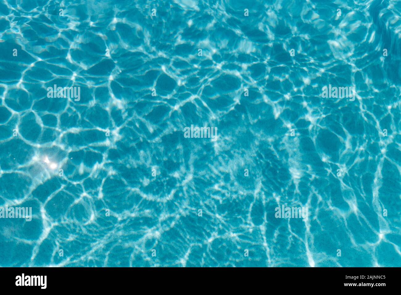 Beautiful refreshing blue swimming pool water. Background of blue water ...