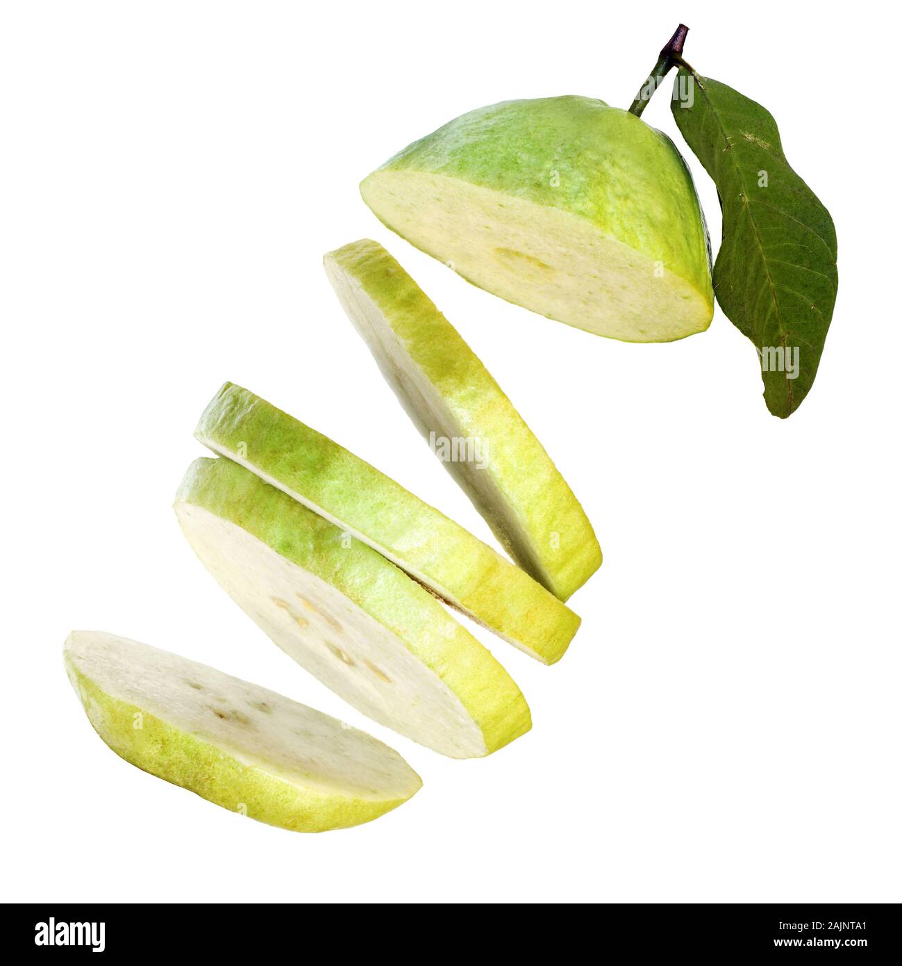 Crispy pearl guava fruit slices falling, isolated on a white background ...