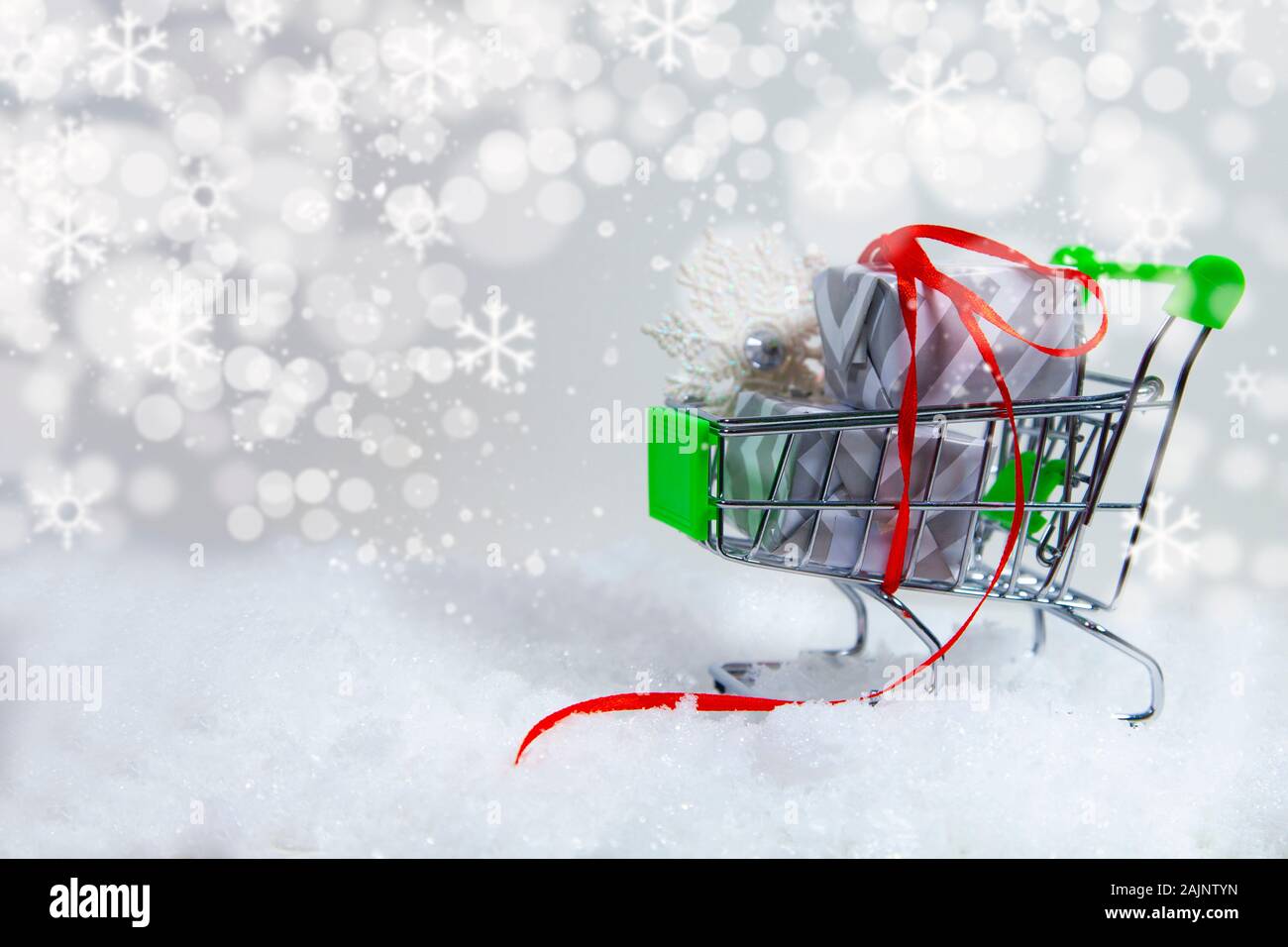 Christmas gifts and shopping cart. Sell-out. Christmas still life with ...
