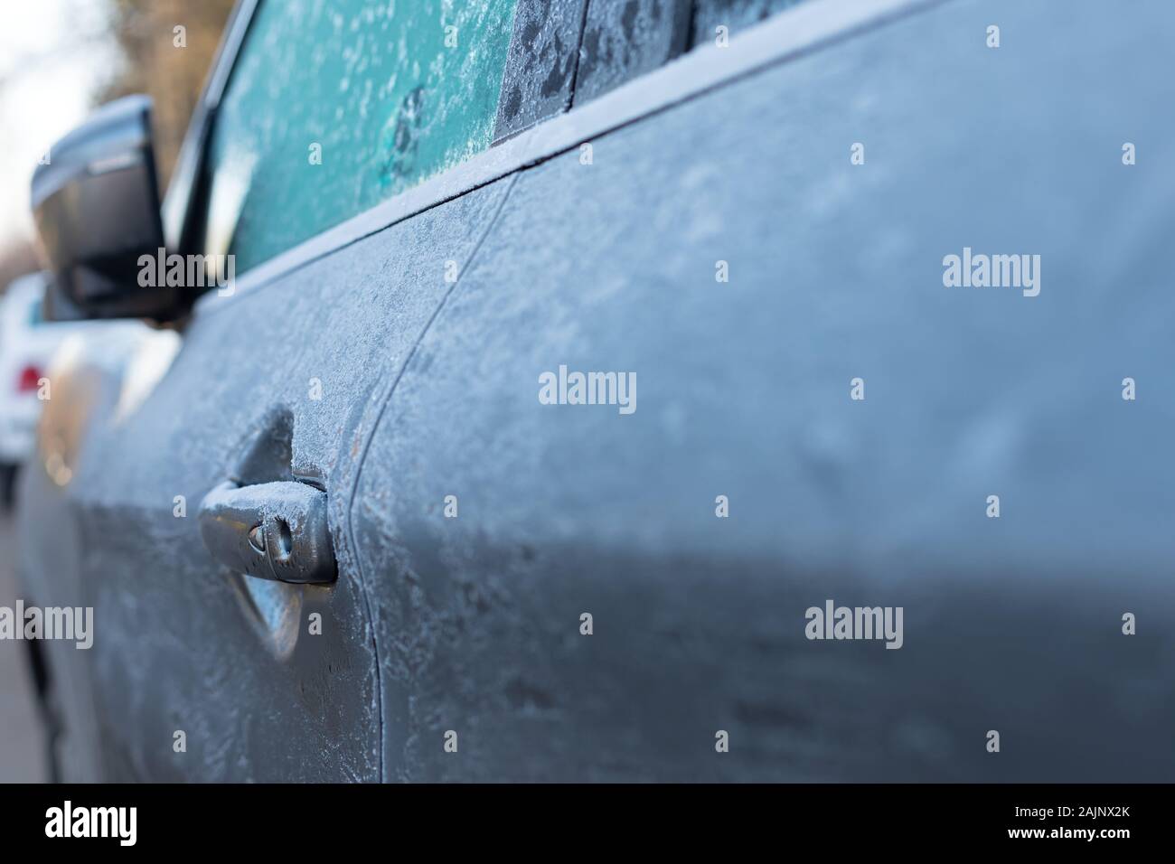 Frozen car parked on the street on December Stock Photo - Alamy