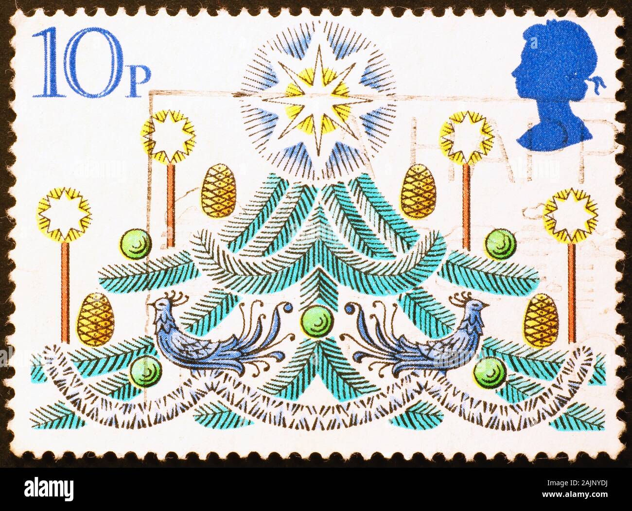 Christmas tree on british postage stamp Stock Photo - Alamy