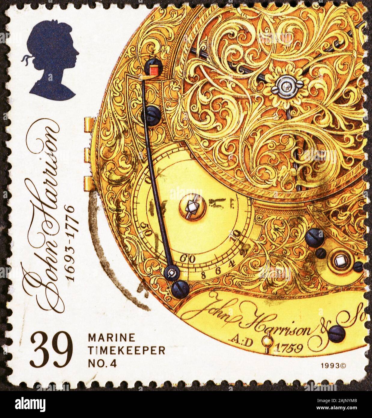 Gold artistic watch on british postage stamp Stock Photo - Alamy