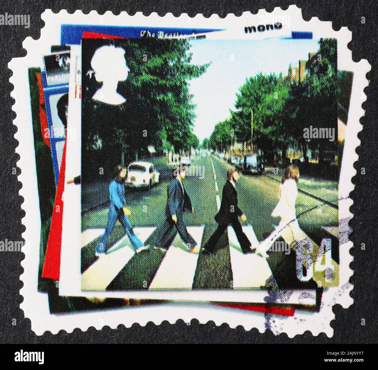 The Beatles crossing Abbey Road on postage stamp Stock Photo - Alamy