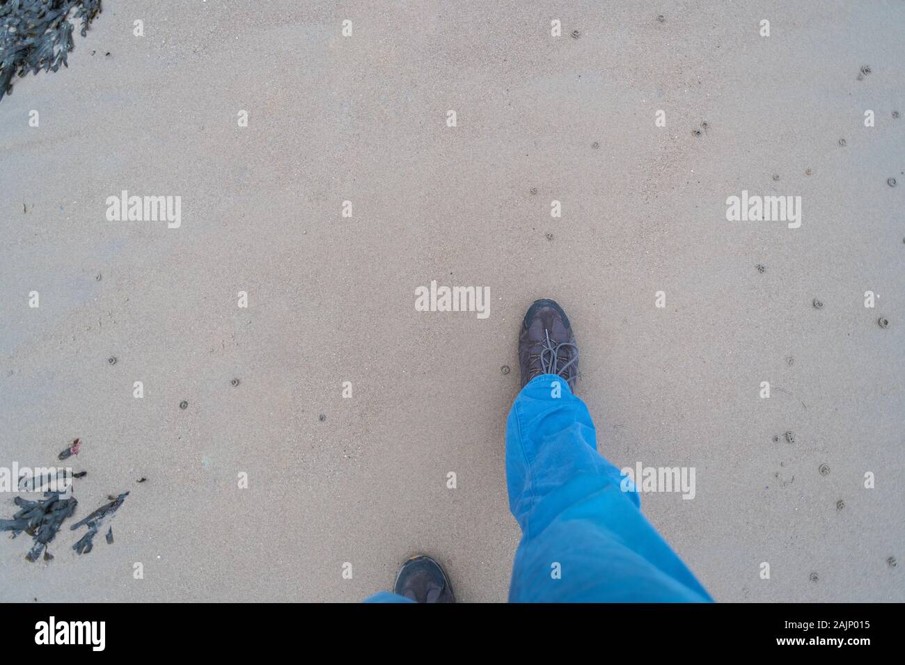 go for a walk on a sandy beach wearing blue pants and trekking shoes ...