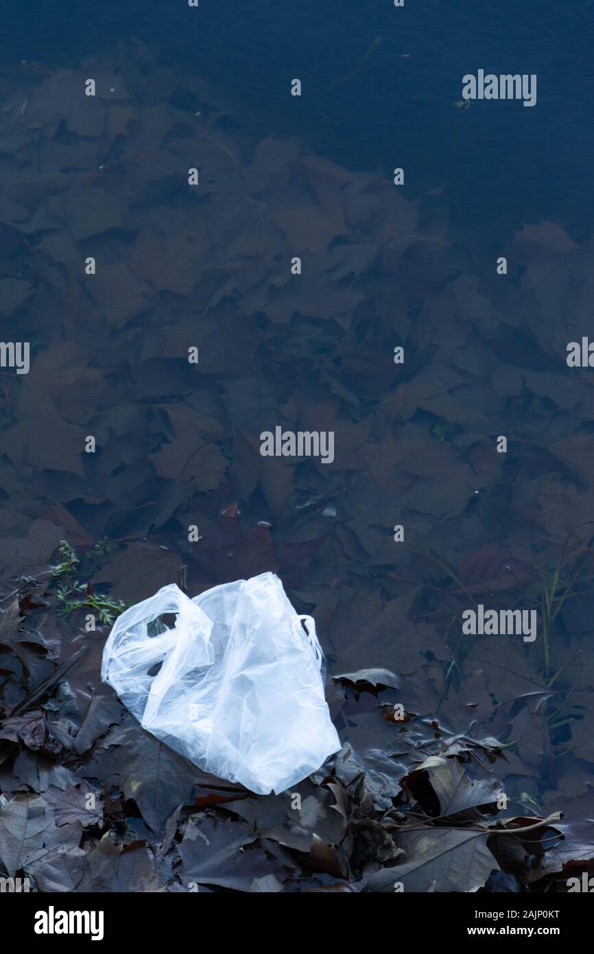 Plastic pollution in nature. Ecology contamination Stock Photo - Alamy