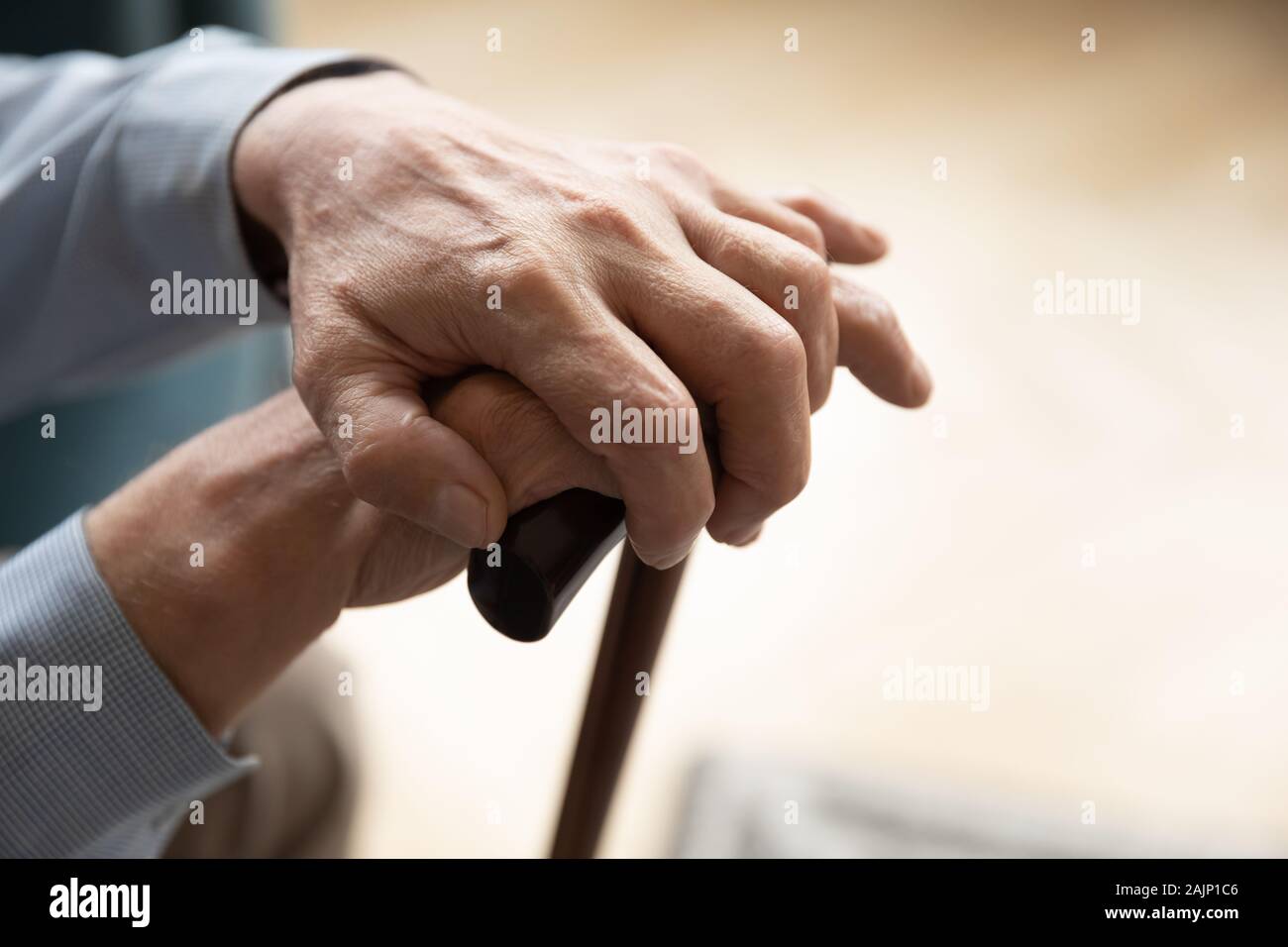Close up view 60s lovely male hands holding cane Stock Photo - Alamy