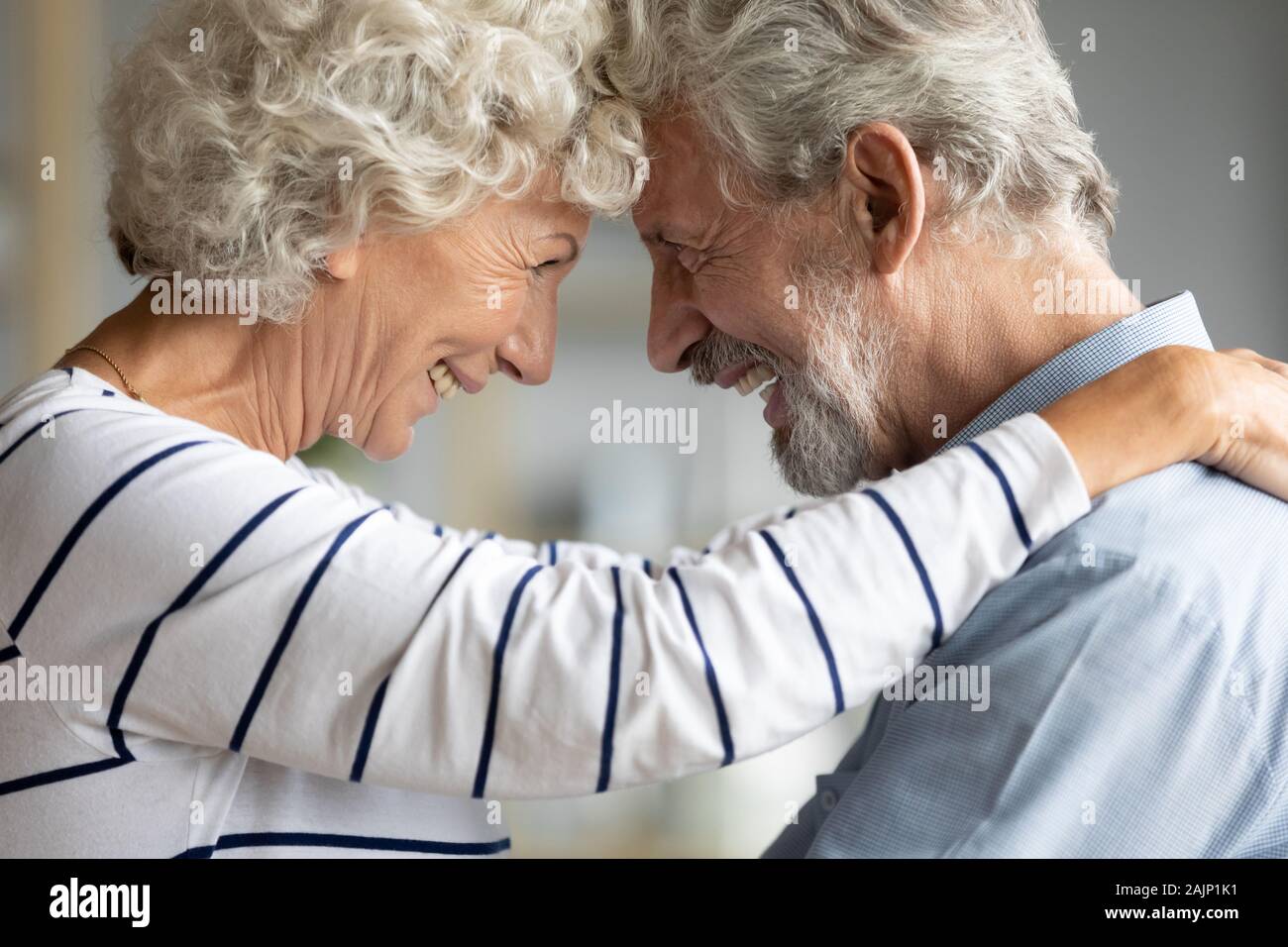 Man and woman foreheads touching hi-res stock photography and images ...