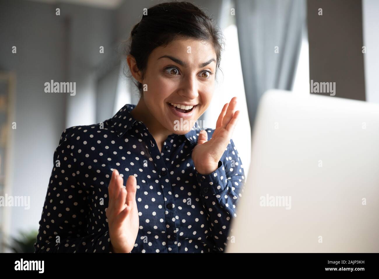 Amazed young indian girl student wow reaction look at laptop Stock ...