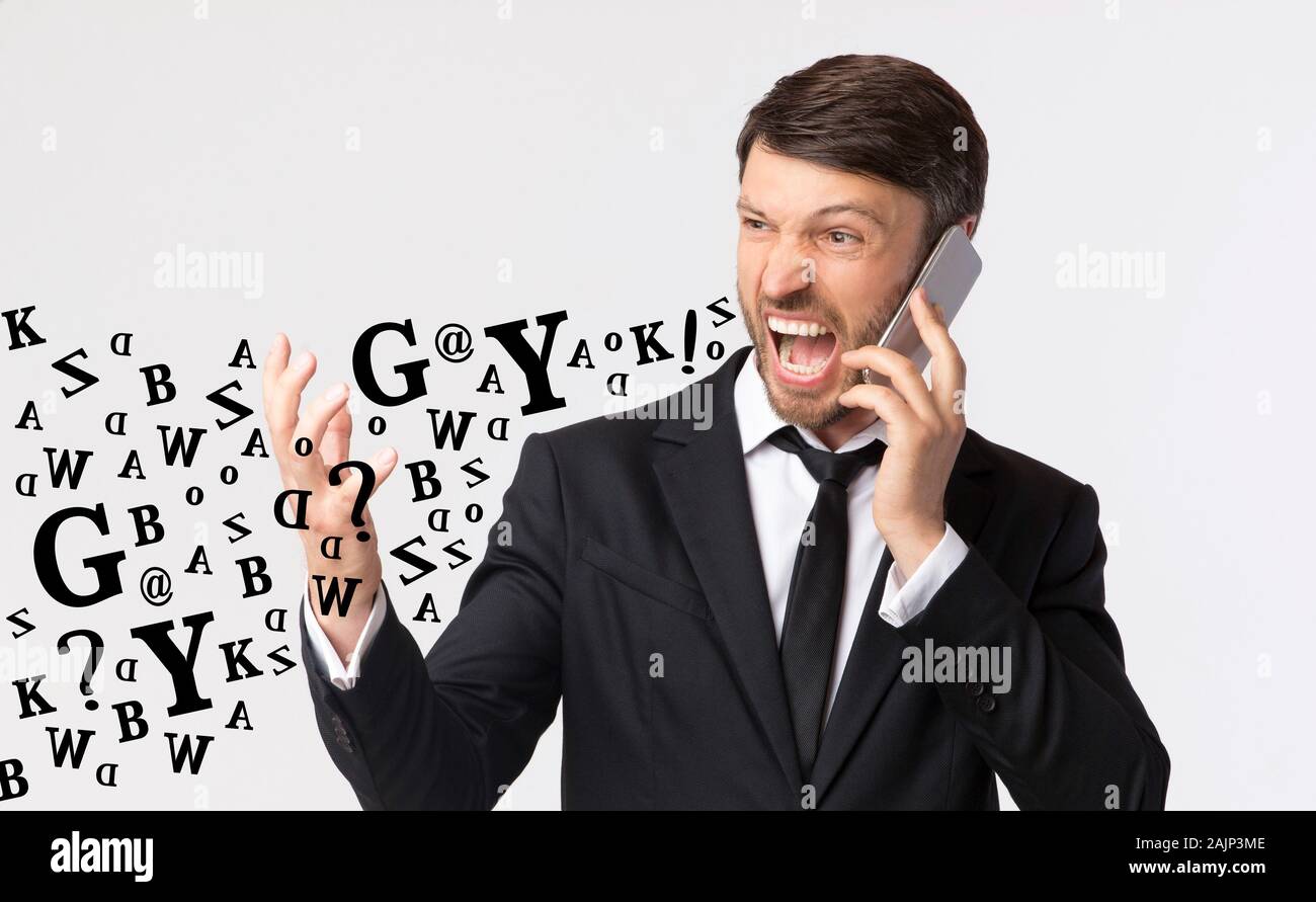 Phone Rage. Furious Businessman Shouting While Talking On Cellphone ...