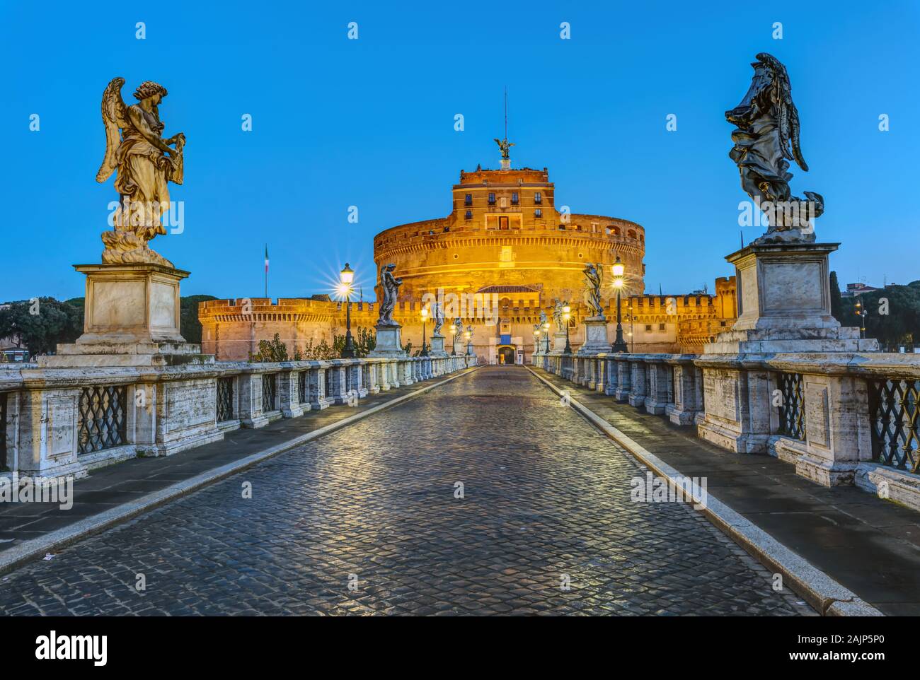 The Castel Sant Angelo and the Sant Angelo bridge in Rome at dawn Stock ...
