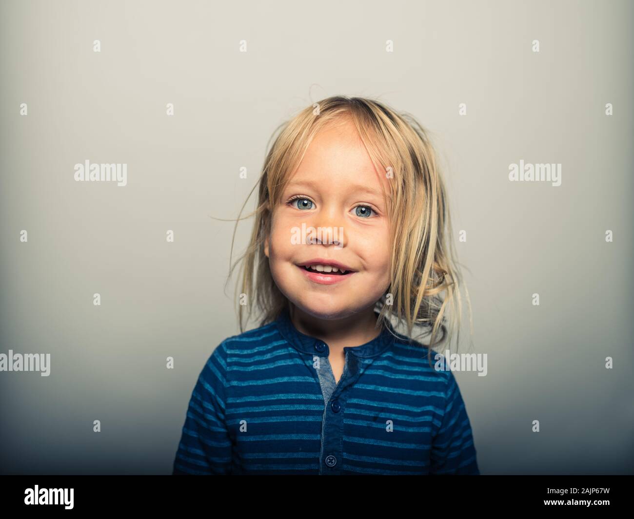 Smiling cheeky grin hi-res stock photography and images - Alamy