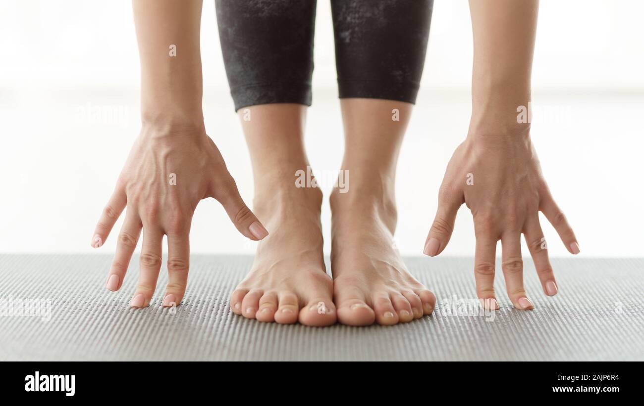 Yoga pose forward bend feet hi-res stock photography and images - Alamy