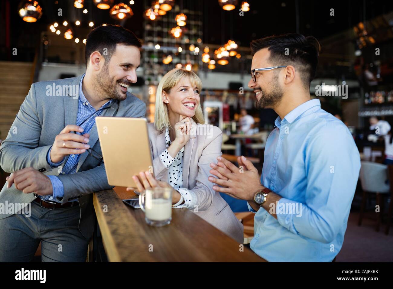 Successful company with happy employees in modern office Stock Photo ...