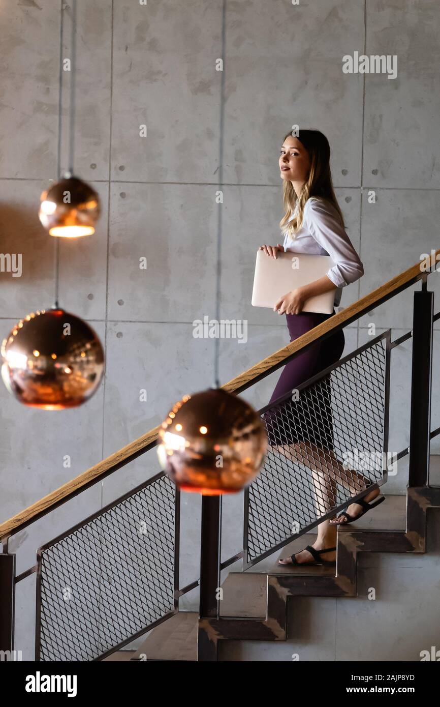 Beautiful executive business woman, ceo, coworker at the workspace ...