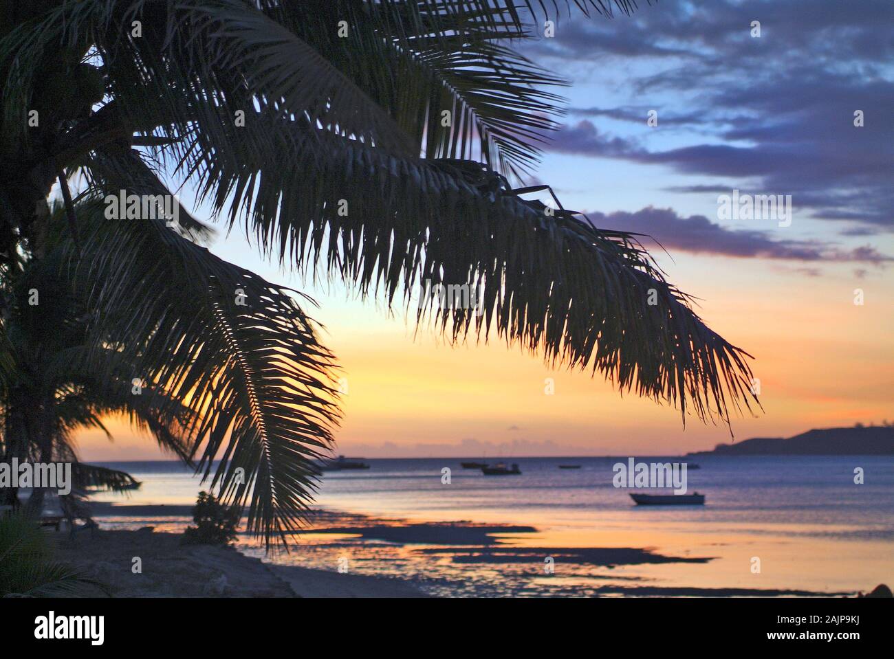 Fiji, sunrise over Malolo Lailai island Stock Photo - Alamy