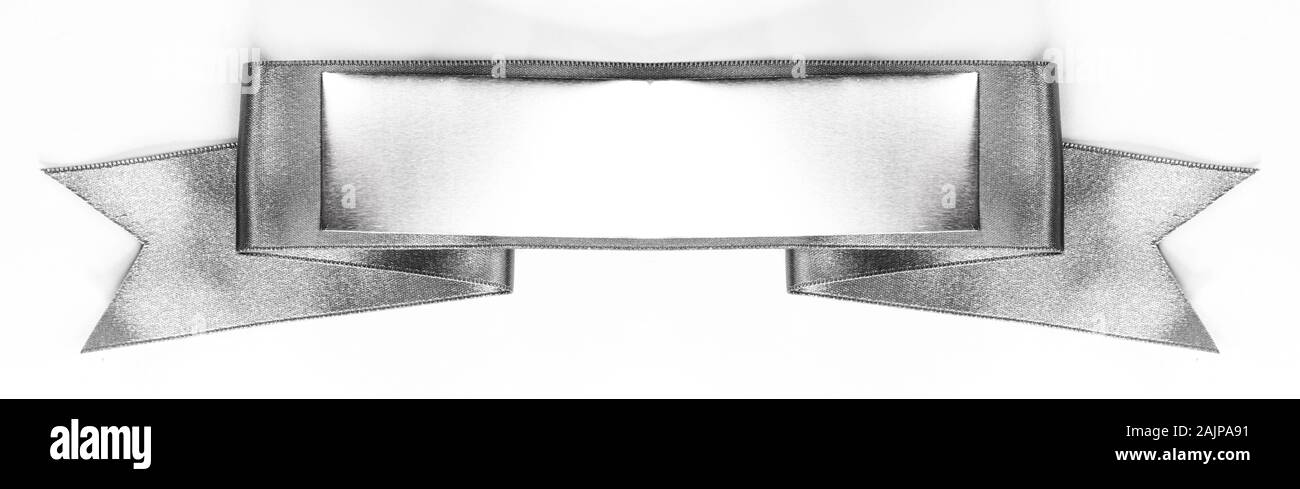 Silver satin ribbon banner with copy space isolated on white background ...