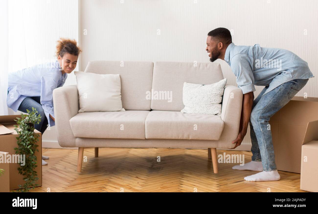 Carrying heavy furniture hi-res stock photography and images - Alamy