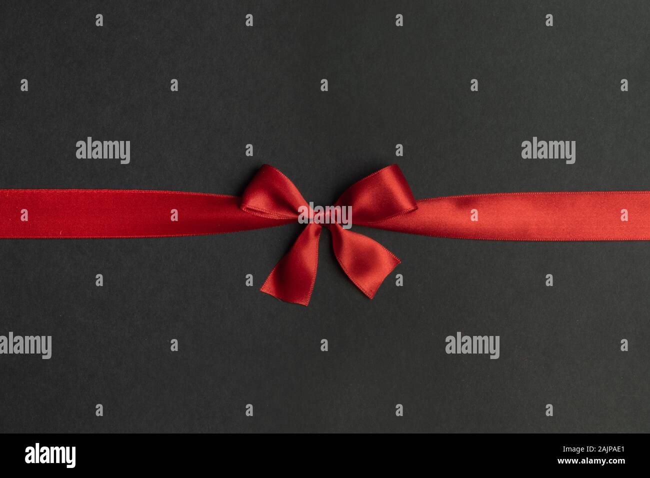 Black festive packaging paper hi-res stock photography and images - Alamy