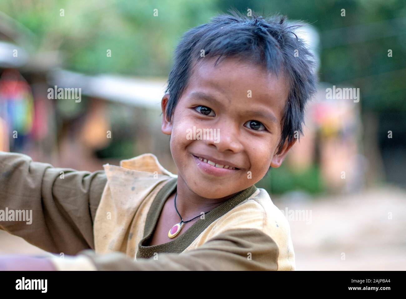 portrait of a bahnar tribe child smiling Stock Photo - Alamy