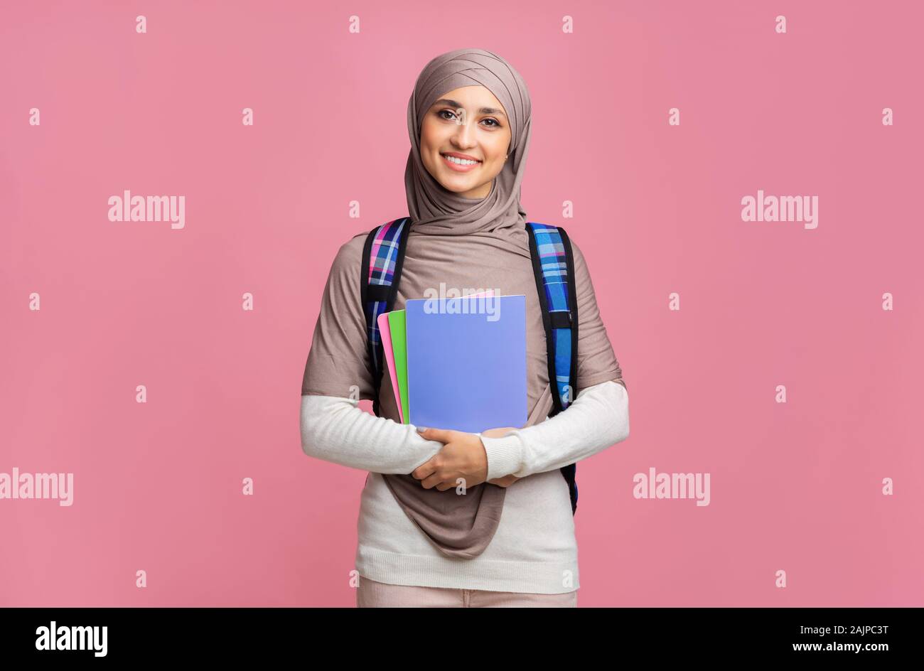 Education In Islam Concept. Portrait of young muslim student girl with ...
