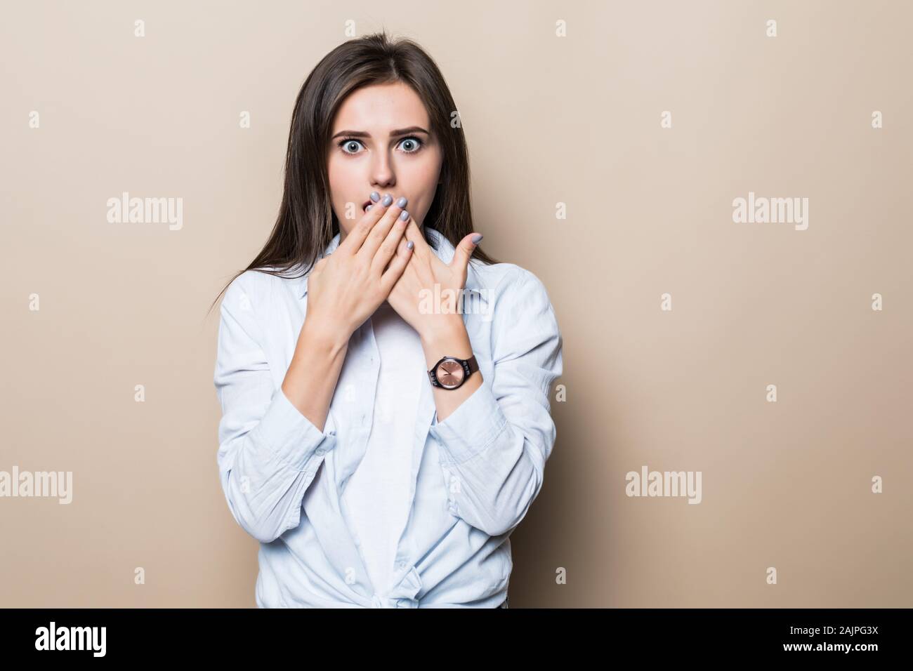 Beautiful confused shocked young woman wearing sweater standing ...