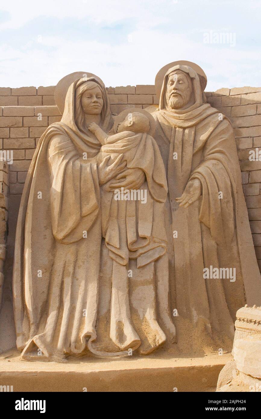 Holy couple showing their baby Jesus to the people Stock Photo - Alamy