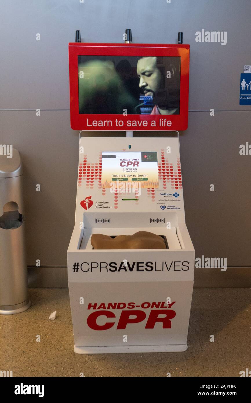 Educational CPR machine at LAX airport Stock Photo - Alamy